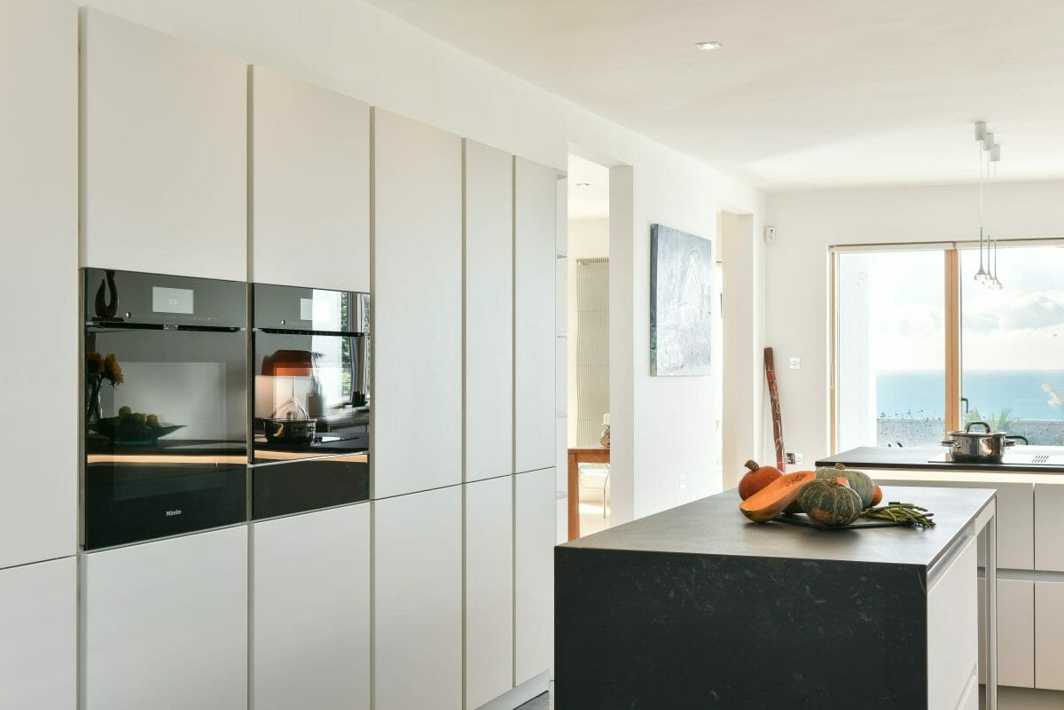 Luxury Seaside Kitchen & Stone Clad Island | Ashley Jay Kitchens